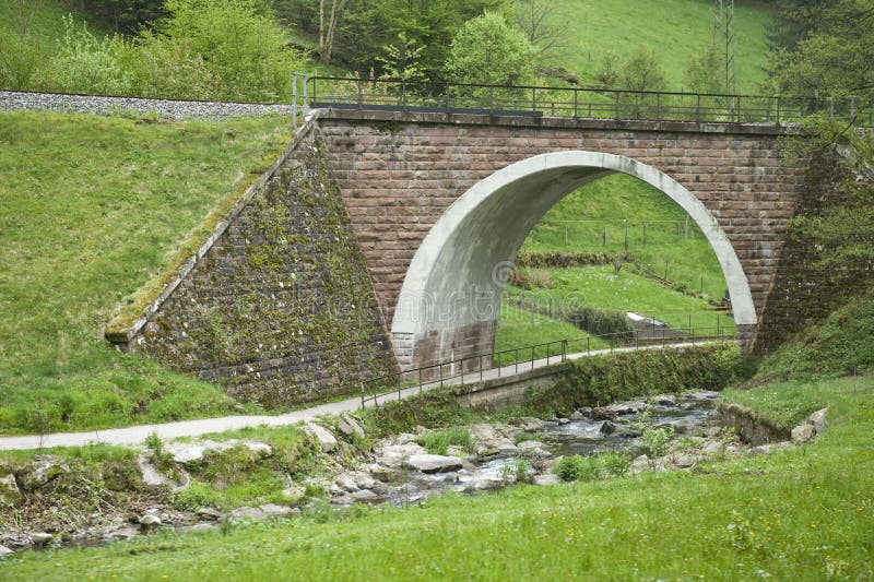 Brown Brick Bridge Surrounded By Trees Picture. Image: 114443058