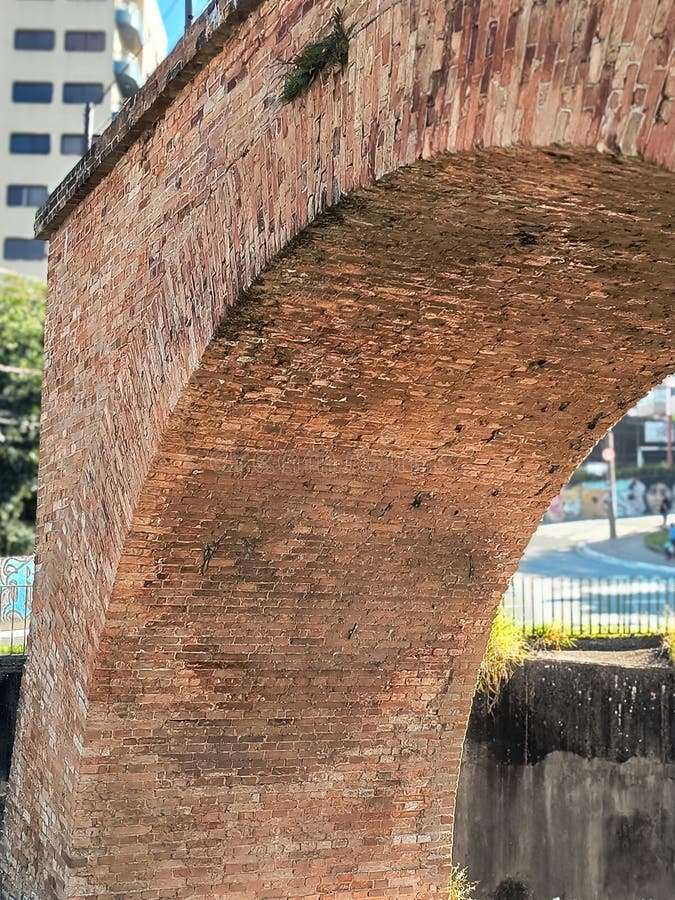 The Brick Bridge is Made in a Country Town and in the Background the ...