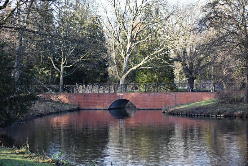 A Brick Bridge Over a Canal. Stock Photo - Image of architecture ...