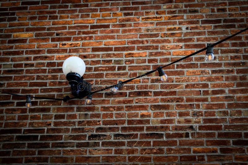 Brick Building Facade with Cafe String Lights Background Stock Photo ...