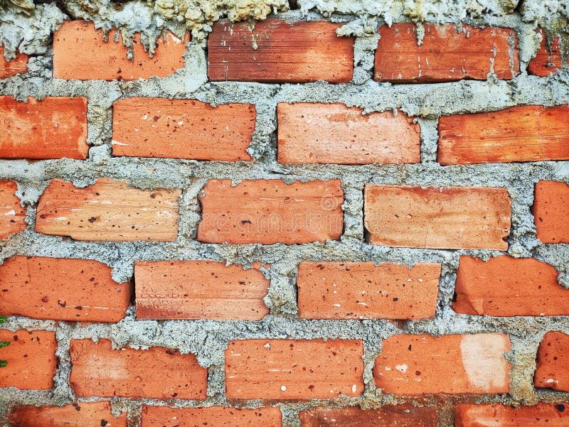 Brick and Cement Pattern on the Wall of the House Stock Photo - Image ...