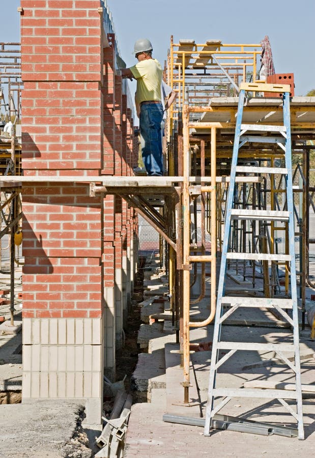Brick Columns with Scaffolding Stock Image - Image of laborer ...