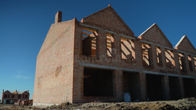Brick Cottage Construction in Progress with Roof Framework Stock Video ...