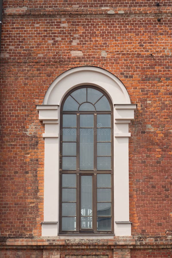 Brick Facade of a House with a Large Window Stock Photo - Image of ...