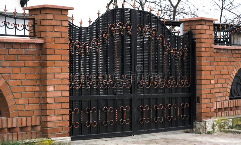 Brick Fence and Forged Gate Stock Photo - Image of landscape ...