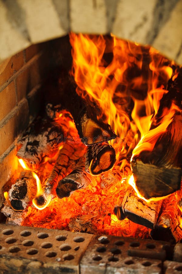 Brick Fireplace with Burning Fire, Red Flame from Woods. Stock Image ...