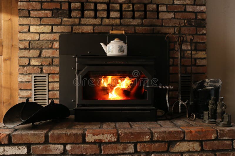 Brick Fireplace with Wood Fire Stock Image - Image of brick, fire ...