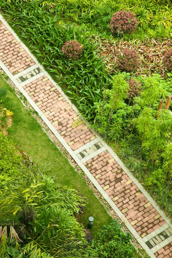 Brick footpath stock image. Image of green, exteriors - 14610459