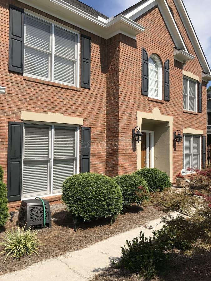 Brick Front House with Landscaping Stock Photo - Image of front, house ...
