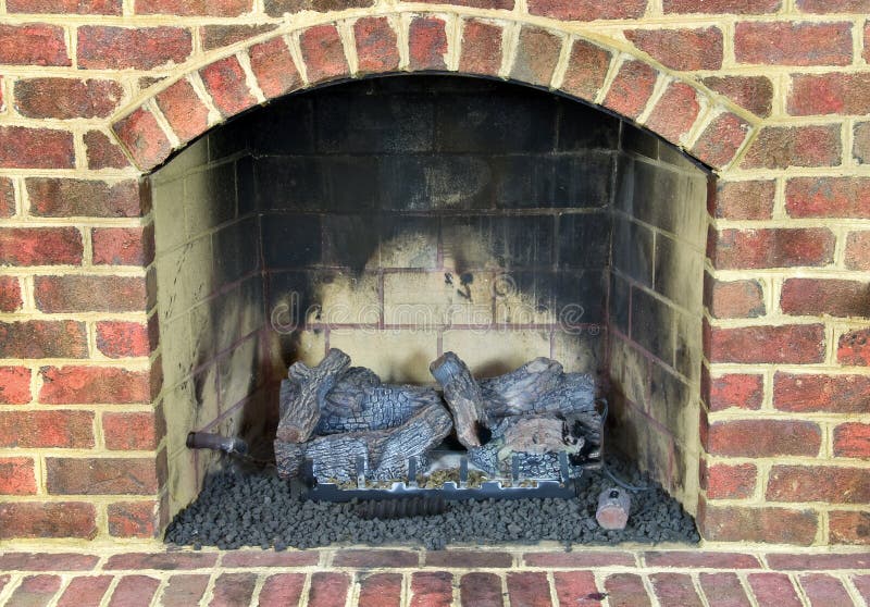 Brick Gas Fireplace Picture. Image: 8259131
