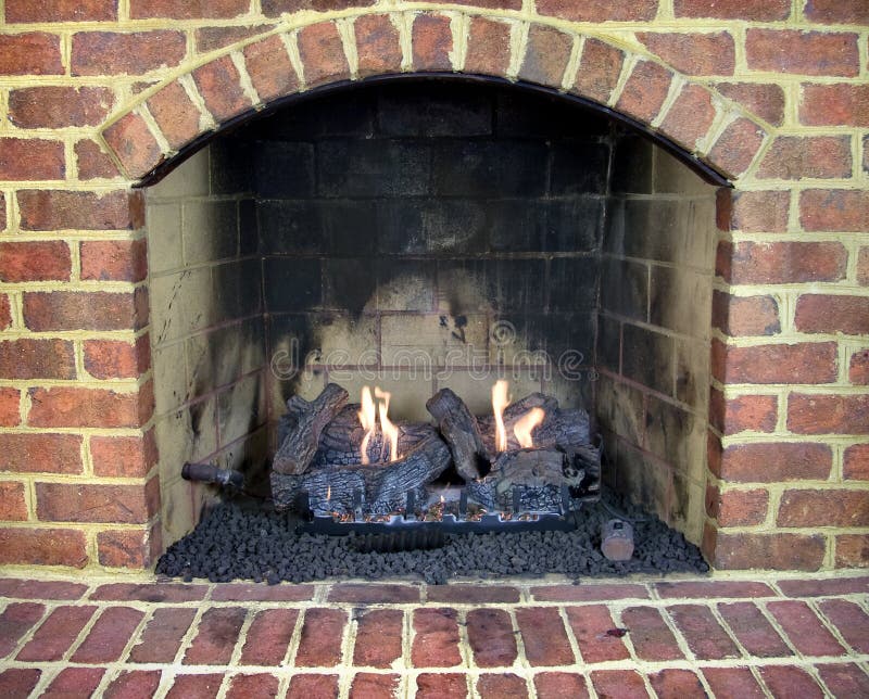 Brick gas fireplace stock photo. Image of inside, flame - 8259248