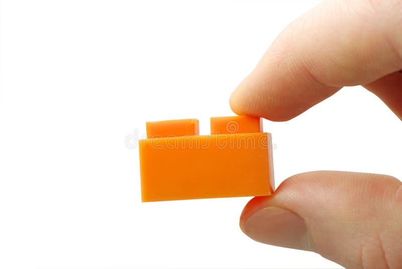 Brick in hand stock photo. Image of completion, home, construction ...