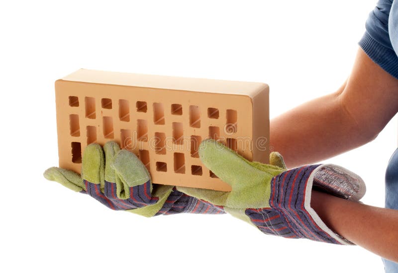 Brick in hand stock image. Image of builder, gear, background - 66550853
