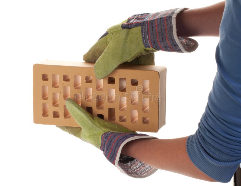Brick in hand stock image. Image of builder, gear, background - 66550853