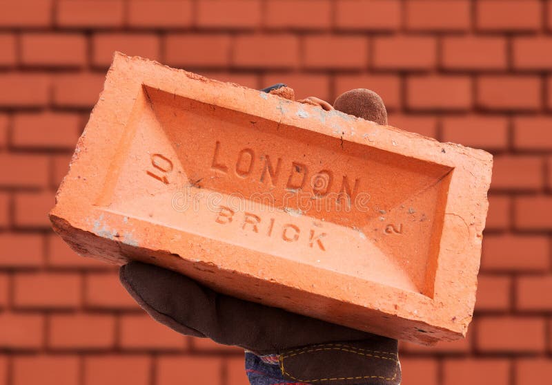 Brick stock photo. Image of hold, close, material, plain - 66989618