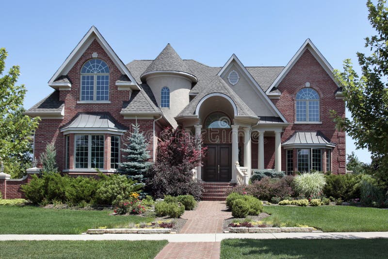 Brick home with turret stock photo. Image of driveway - 20848818