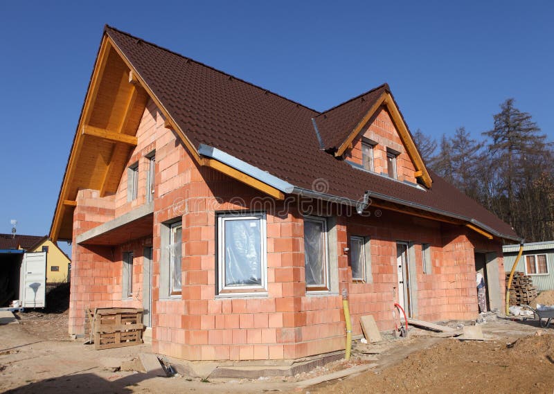 Brick house being built stock image. Image of brick, construction ...