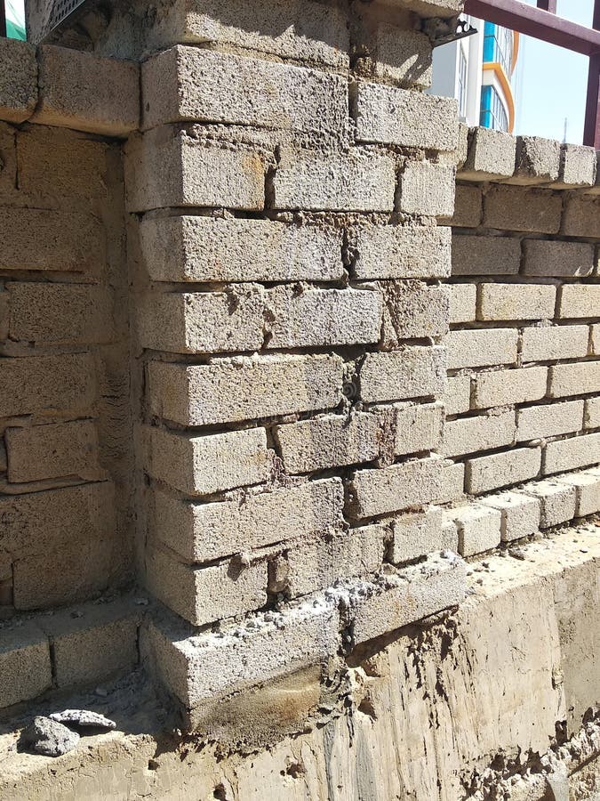 Brick Installation Works at Construction Sites. Stock Image - Image of ...