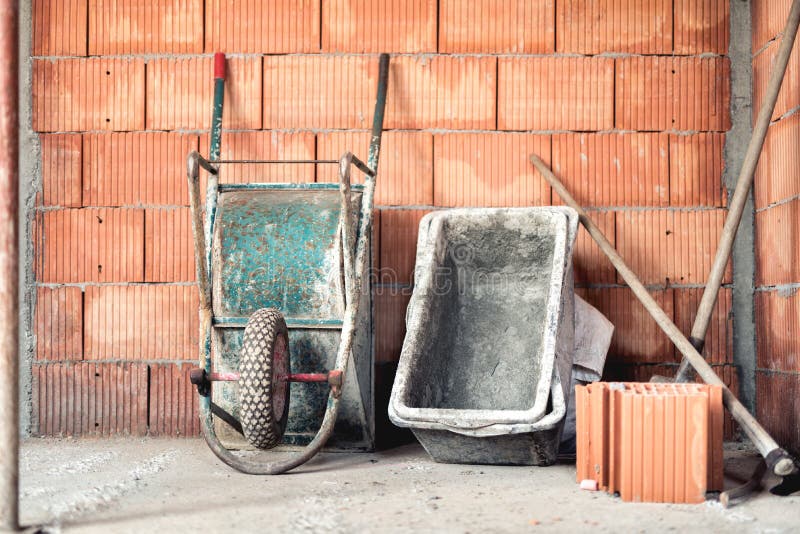 Brick Layering with Mortar, Wheel Barrow and Cement Mixer on ...