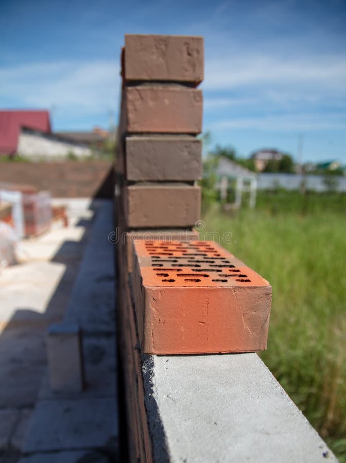 Brick Laying in the Wall at a Construction Site at Home Stock Image ...