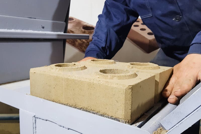 Brick Making By Hand Pressing In Clamping Mechanism Stock Image - Image ...