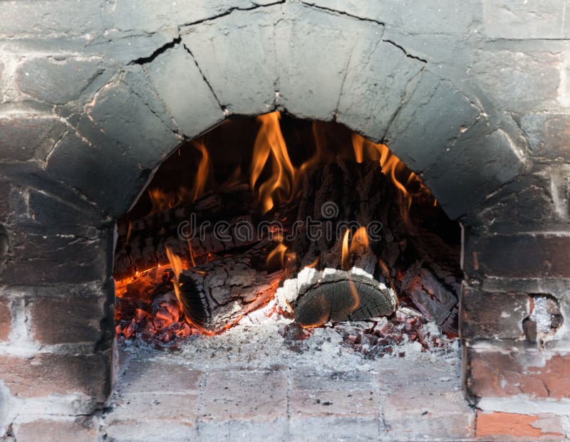 Brick Oven with a Fire Roaring Stock Image - Image of burnt, burn ...