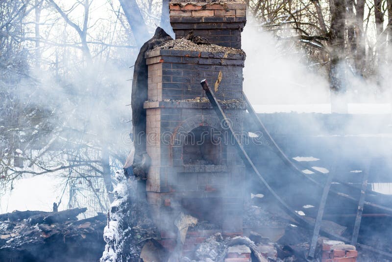 Brick Oven at the Site of the Ruins of a Burnt House, Thick Smoke after ...