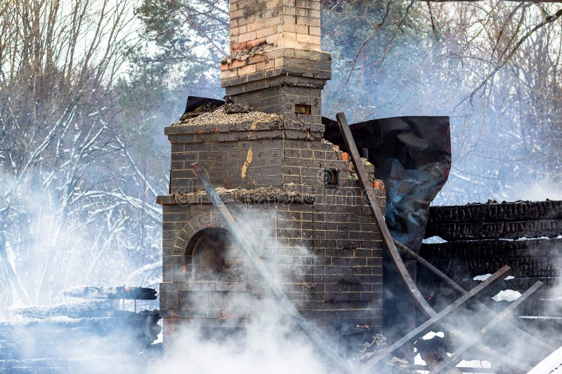 Brick Oven at the Site of the Ruins of a Burnt House, Thick Smoke after ...