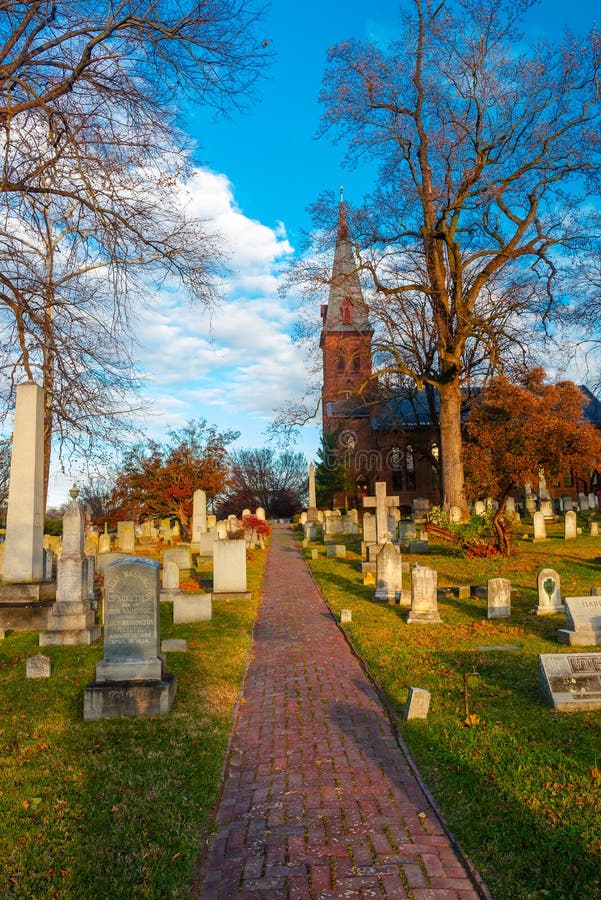 Brick Path between the Graves in the Cemetery Editorial Photography ...