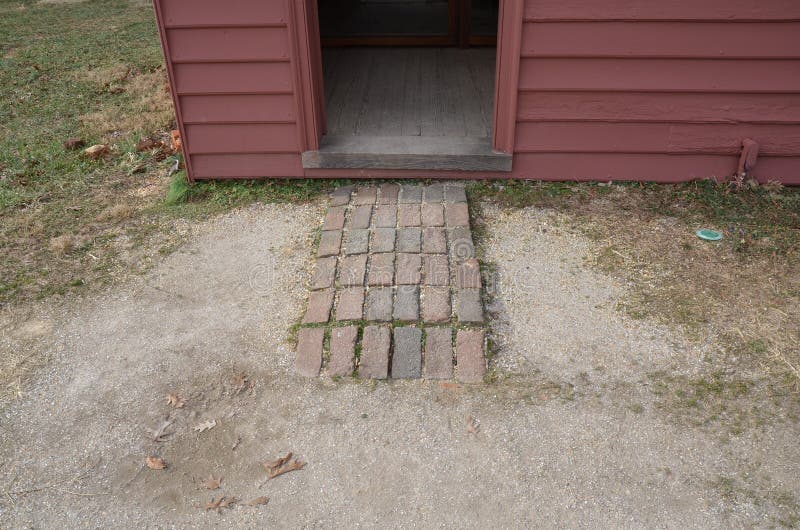 Brick Path or Trailing and Red Building Stock Image - Image of entrance ...