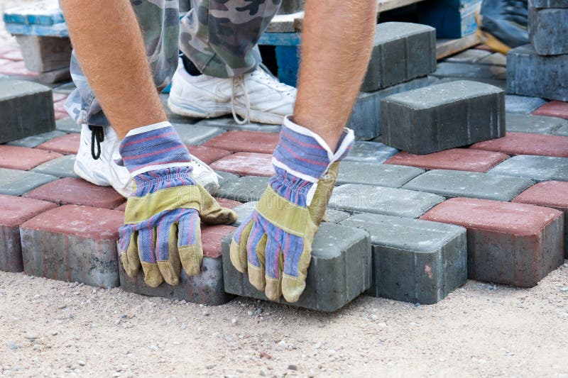 Laying Paving Bricks on Soil Stock Photo - Image of outdoors, brick ...