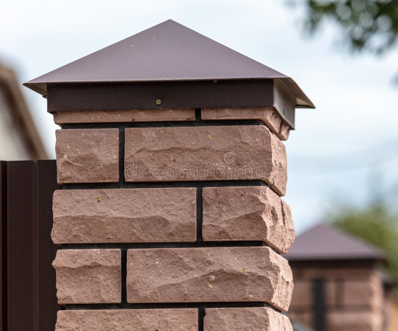 Brick pillar in the fence stock photo. Image of metal - 171284000