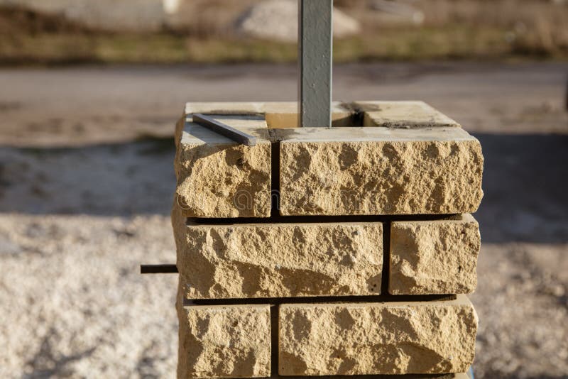 Brick Posts on a Fence As a Background Stock Image - Image of stone ...