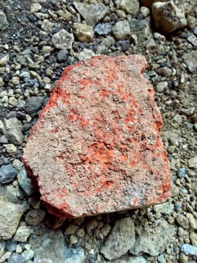 Brick between the Rocks and the Ground Stock Photo - Image of rocks ...