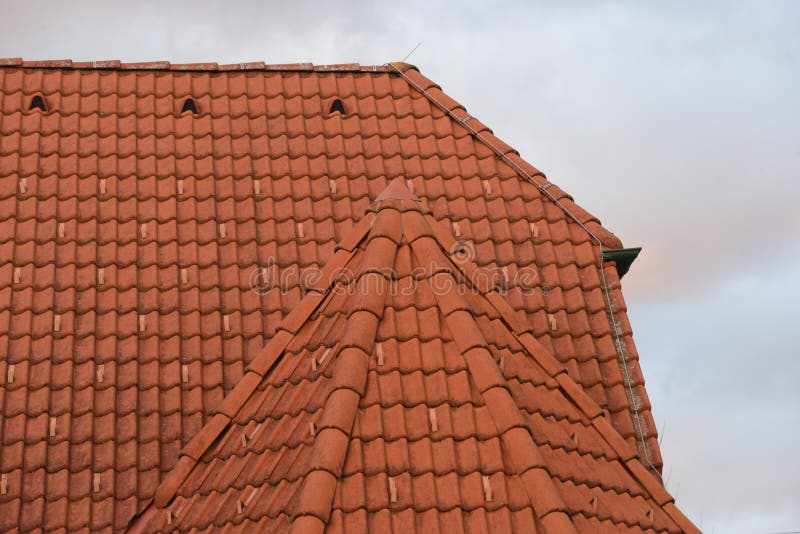 Brick roof tiles of a roof stock photo. Image of architecture - 211360862