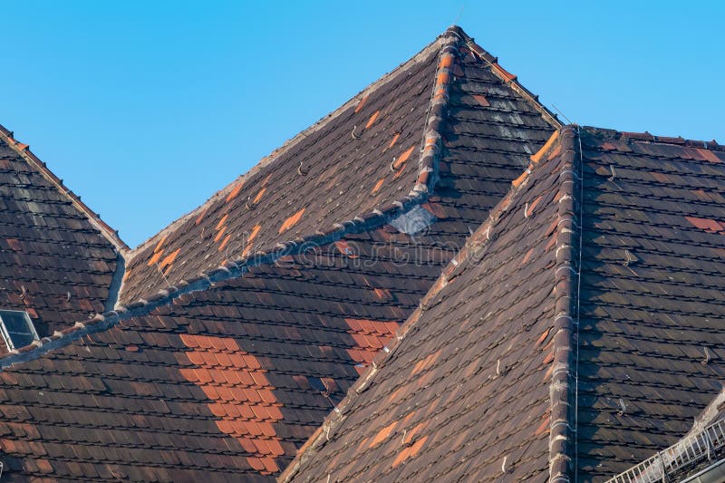 Brick Rooftop of a Building Against the Clear Blue Sky Stock Photo ...