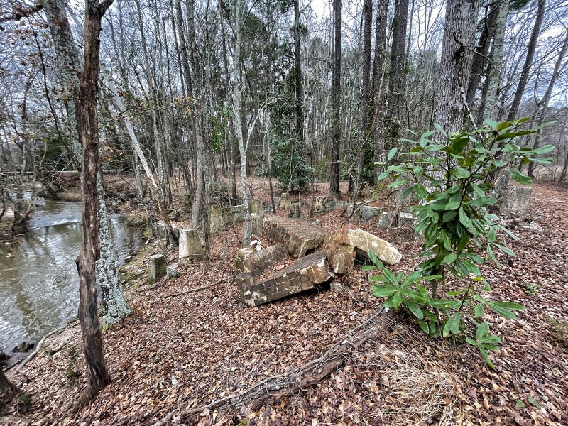 Brick Ruins and River with Fall Foliage in a Forest Stock Photo - Image ...