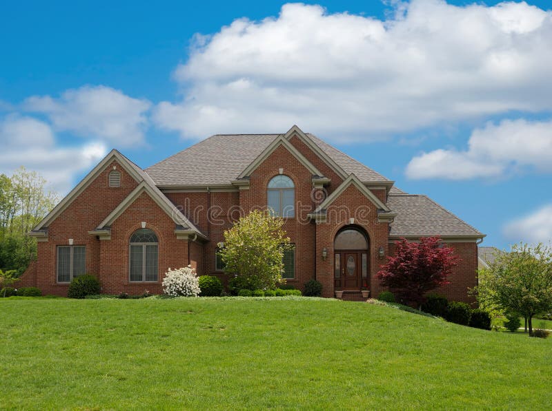 Brick Suburban Ranch Home stock image. Image of realty - 5580401