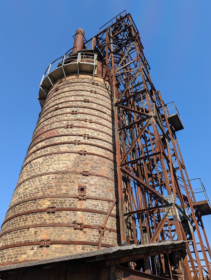 Rusty Tower Support Rising To Blue Sky in Abandoned Factory Stock Image ...