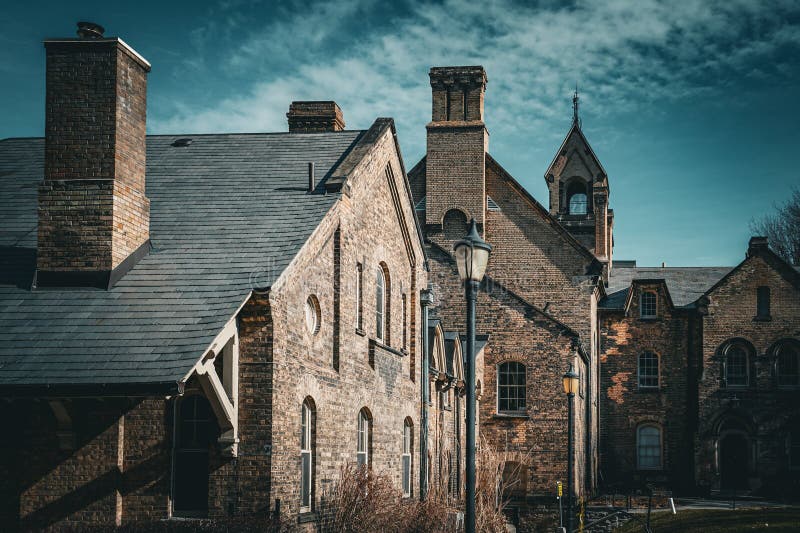 Brick university building editorial stock photo. Image of roof - 337181373