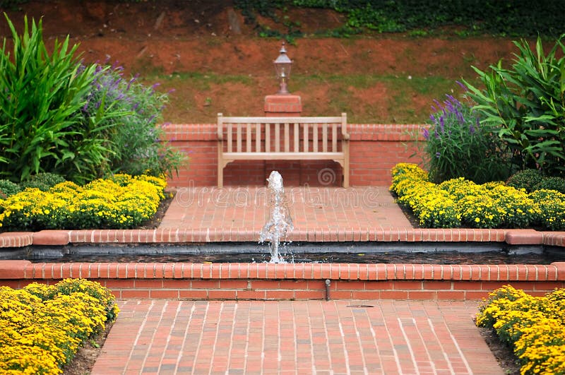 Brick Walkway and Garden Water Fountain Bench Stock Photo - Image of ...