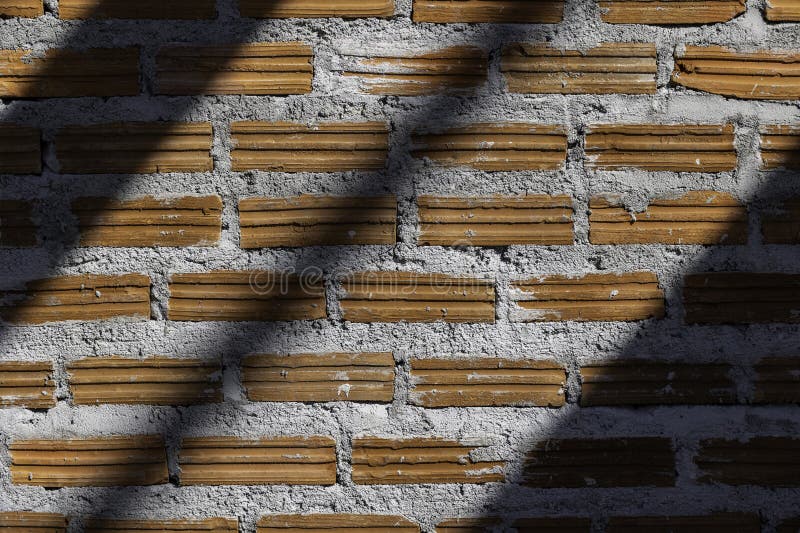 Brick Wall Background with Shadow Stock Photo - Image of concrete ...