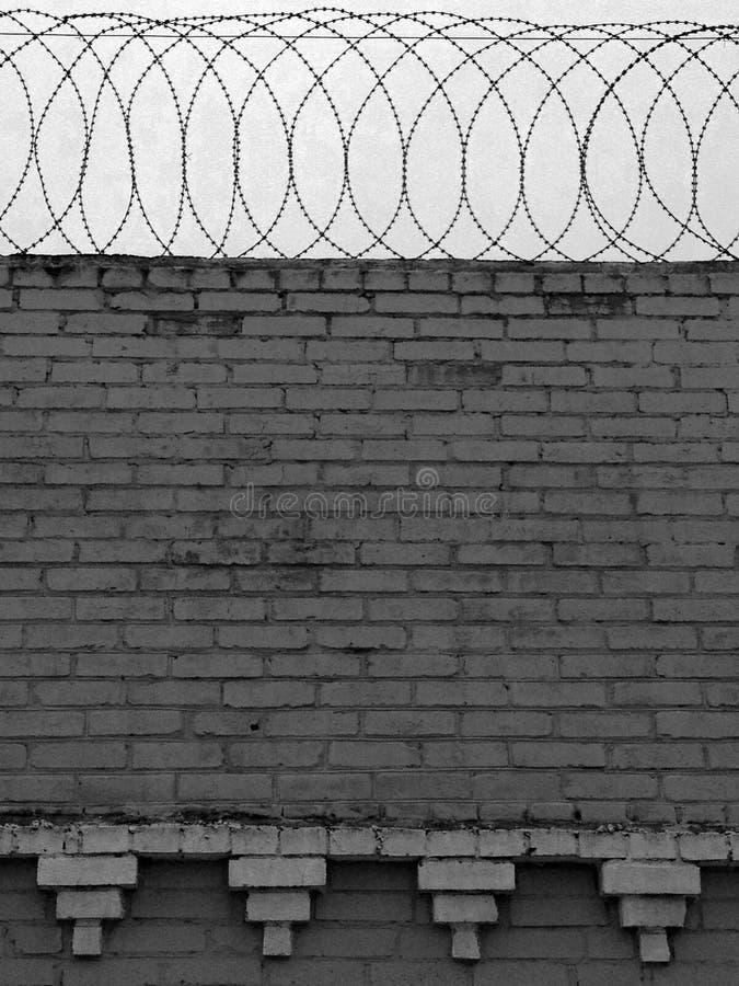 Brick Wall with Barbed Wire on Top Stock Photo - Image of backgrounds ...