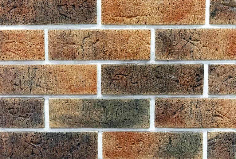 Brick Wall of Beige and Brown Bricks. Background and Texture of ...