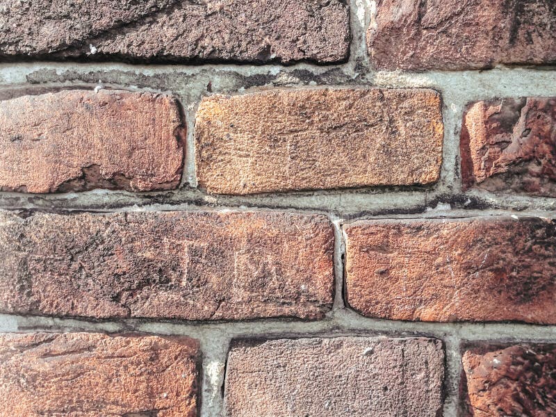 A Brick Wall with a Brown and Tan Color Stock Image - Image of surface ...