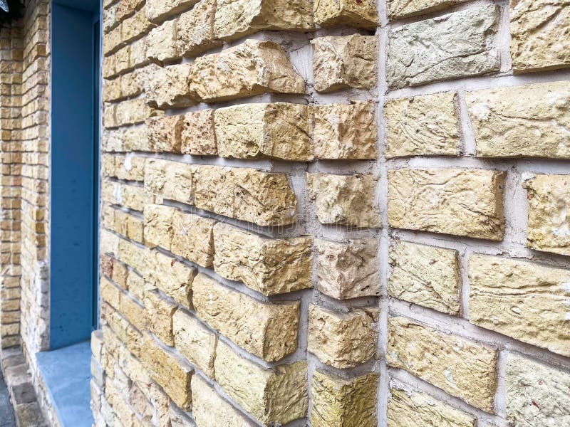 Brick wall of a building stock photo. Image of orange - 209458652