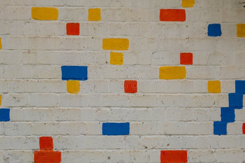 Brick Wall with Coloured Bricks Stock Photo - Image of simple, modern ...
