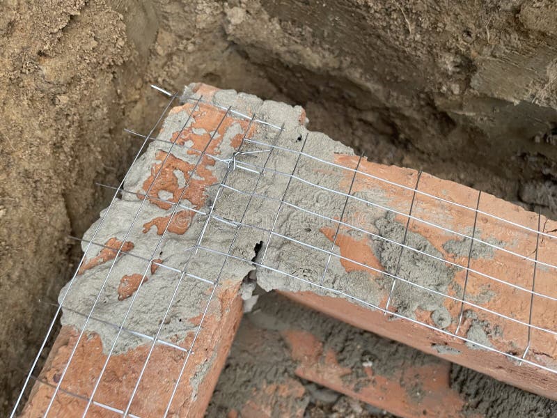 Brick Wall Construction with Horizontal Steel Reinforcement Stock Photo - Image of layer ...