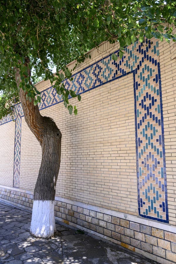 A Brick Wall Decorated with a Traditional Uzbek Pattern in the Shade of ...