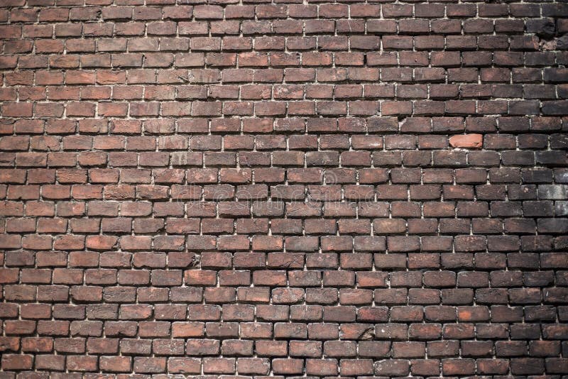 Brick wall differently lit stock photo. Image of antique - 123192882